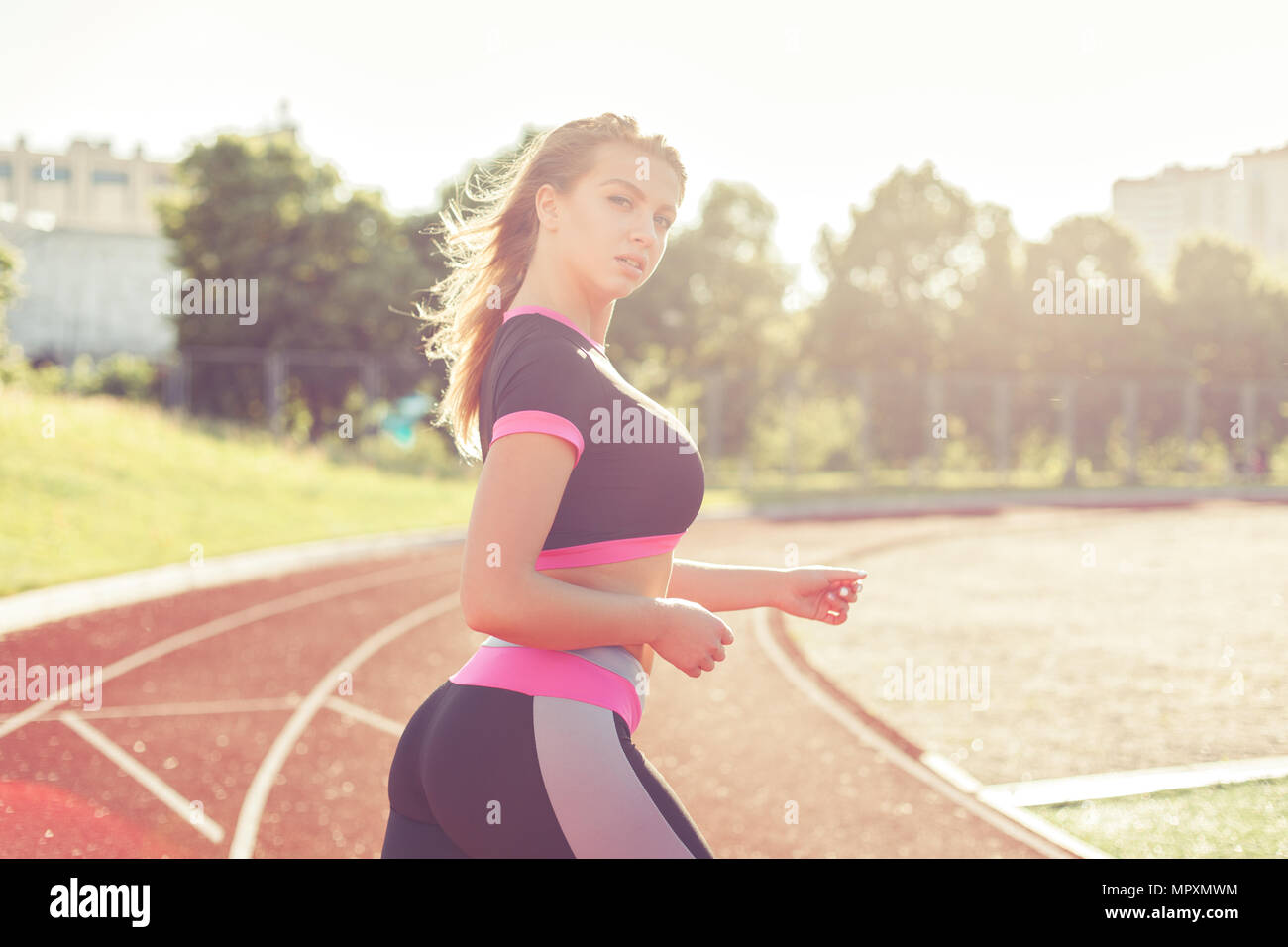 Woman in a stadium hi-res stock photography and images - Alamy