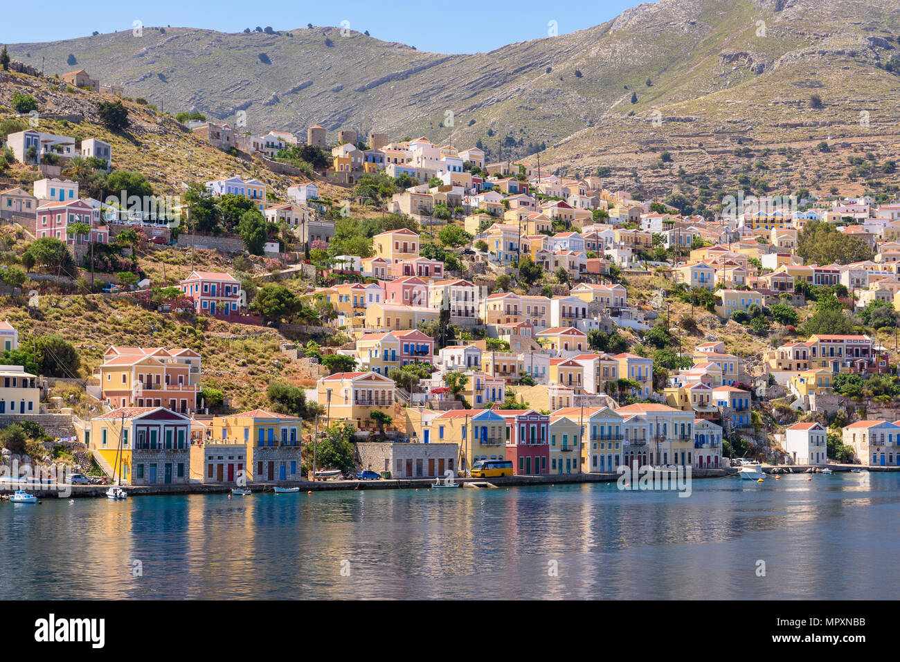 Colorful houses on the hillside of the island of symi. Greece Stock ...
