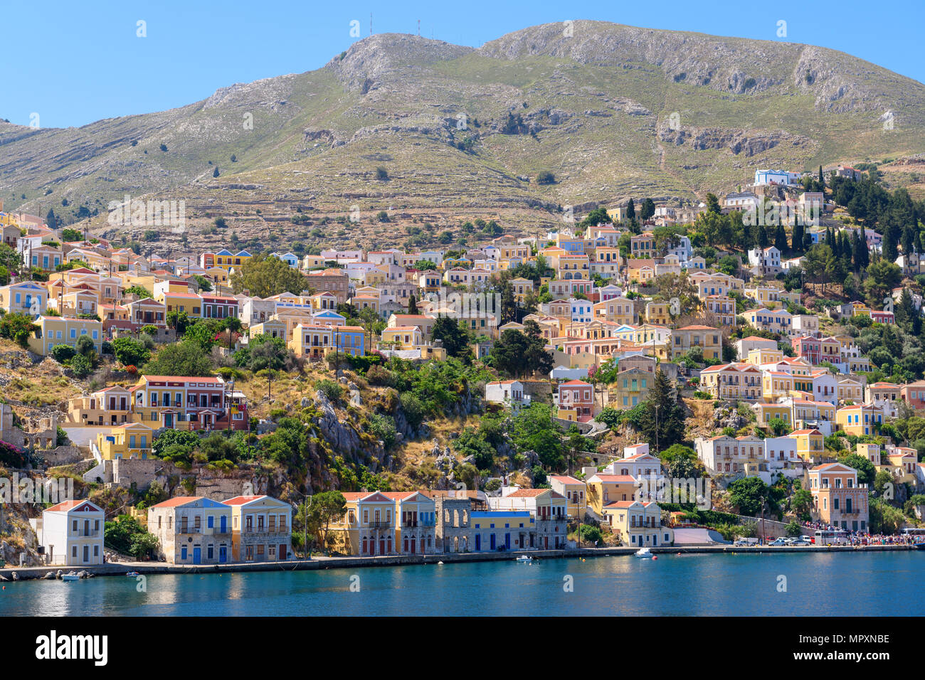 Colorful houses on the hillside of the island of symi. Greece Stock ...
