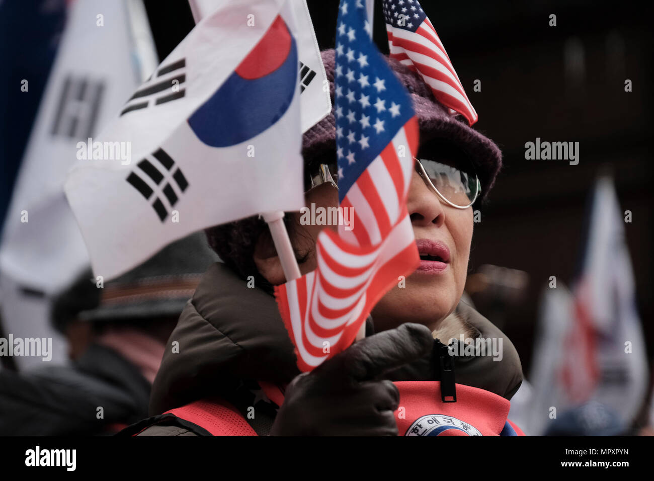 Member of conservative group hold the South Korean and U.S flag during ...