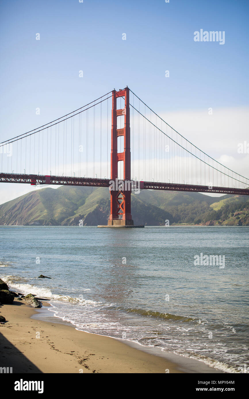 Golden Gate Bridge over bay against mountains Stock Photo - Alamy