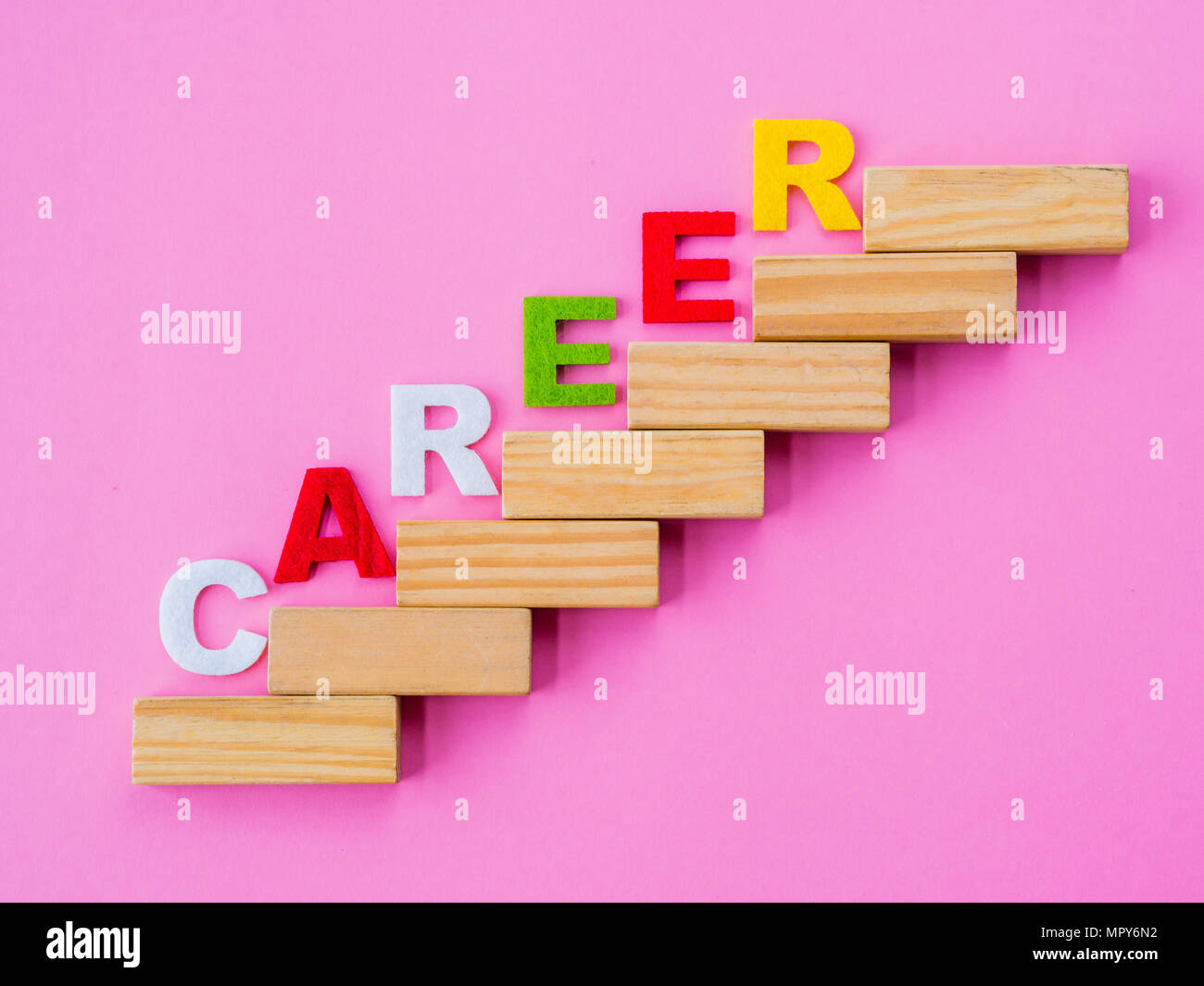 Wood block stacking as step stair with colorful of "CAREER" word on it ...
