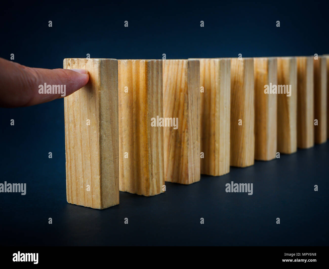 Hand push dominoes continuous hi-res stock photography and images - Alamy