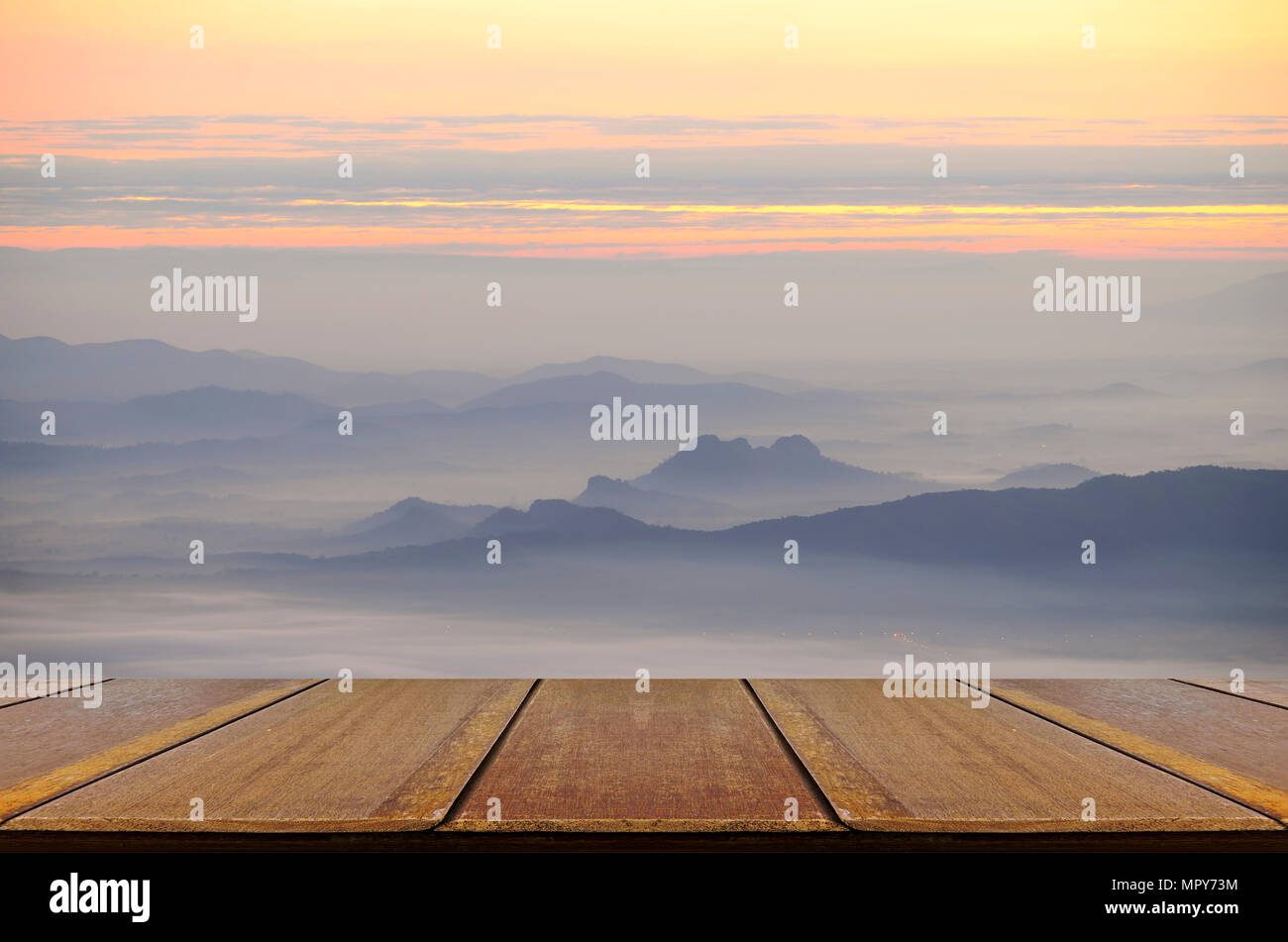 Perspective wood table with mountain and the mist view Stock Photo - Alamy
