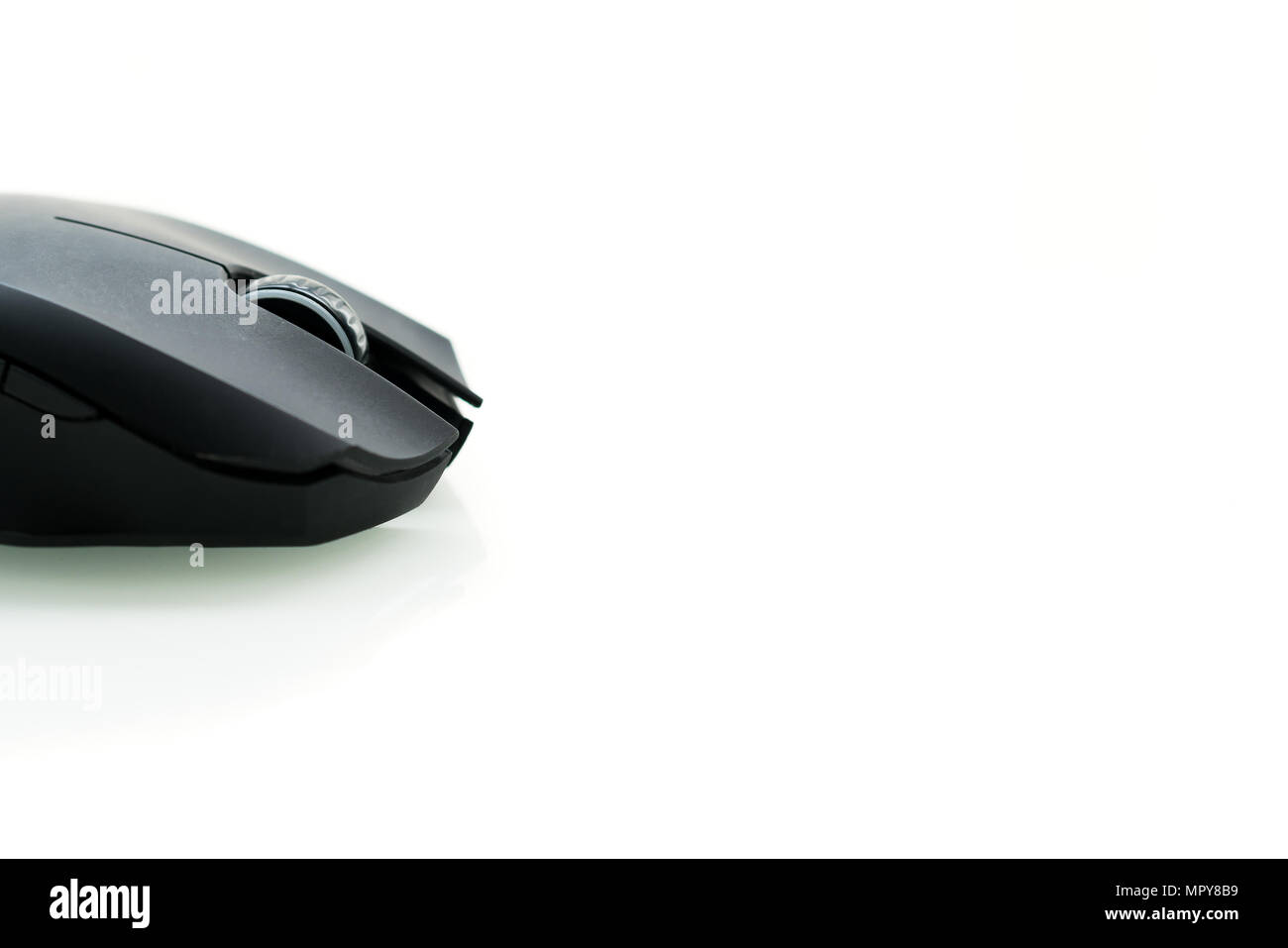 Wireless black computer mouse isolated on white background, closeup ...