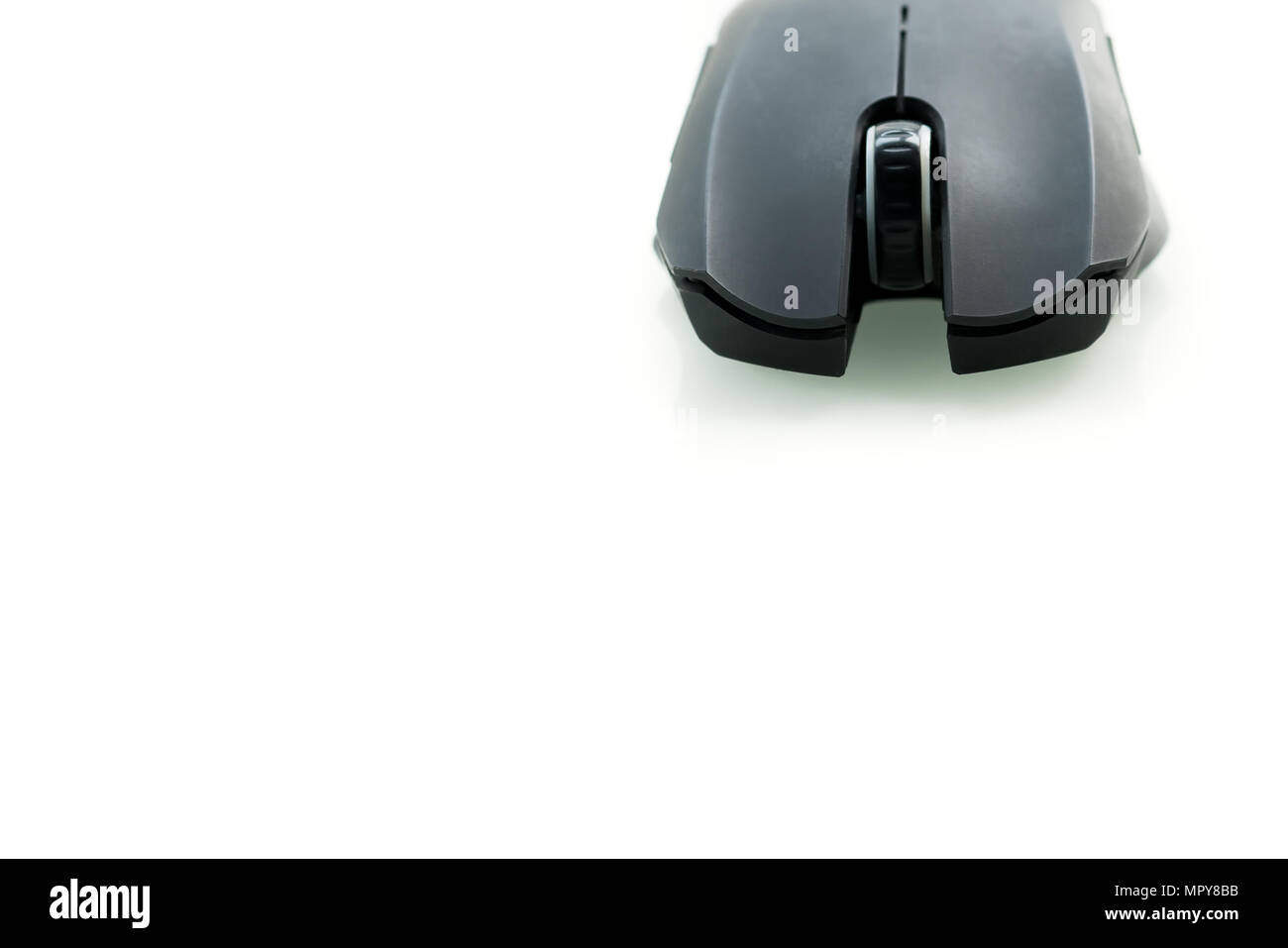 Wireless black computer mouse isolated on white background, closeup ...