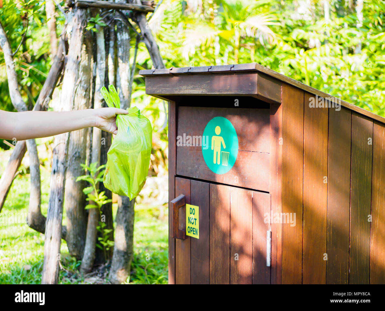 Woman Black Rubbish Bin High Resolution Stock Photography and Images ...