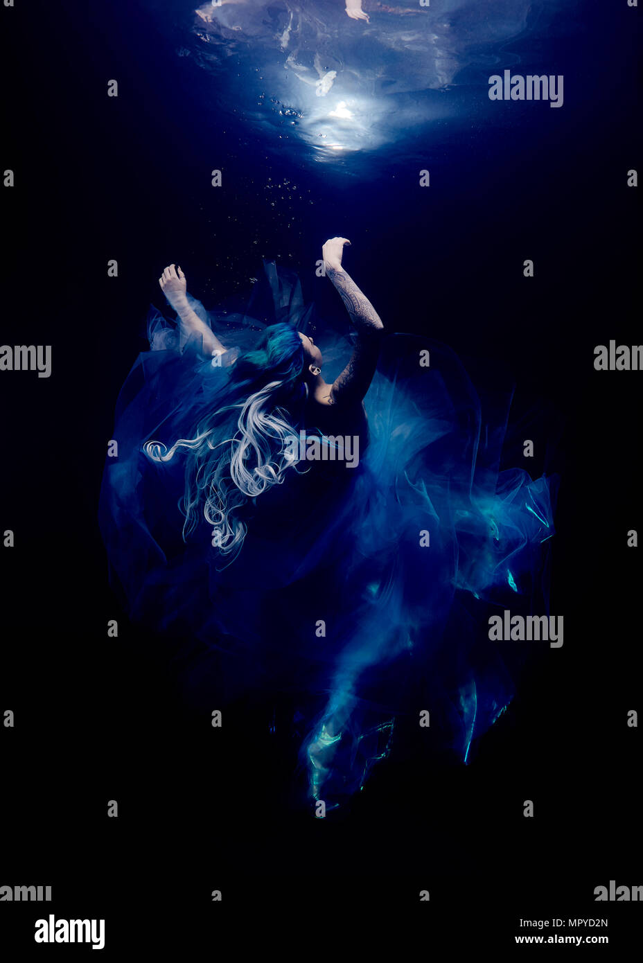 Woman underwater dive falling hi-res stock photography and images - Alamy