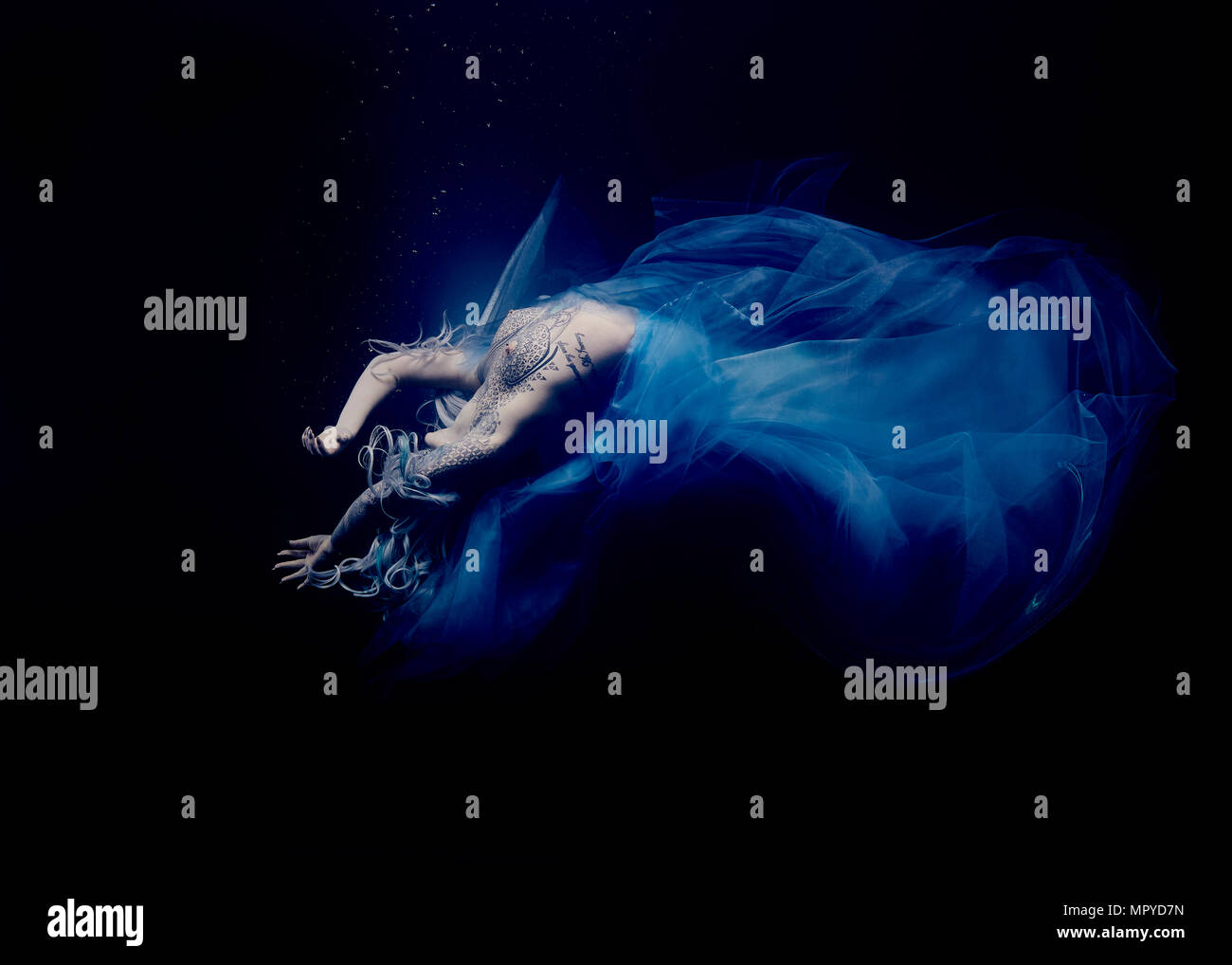 Woman underwater dive falling hi-res stock photography and images - Alamy