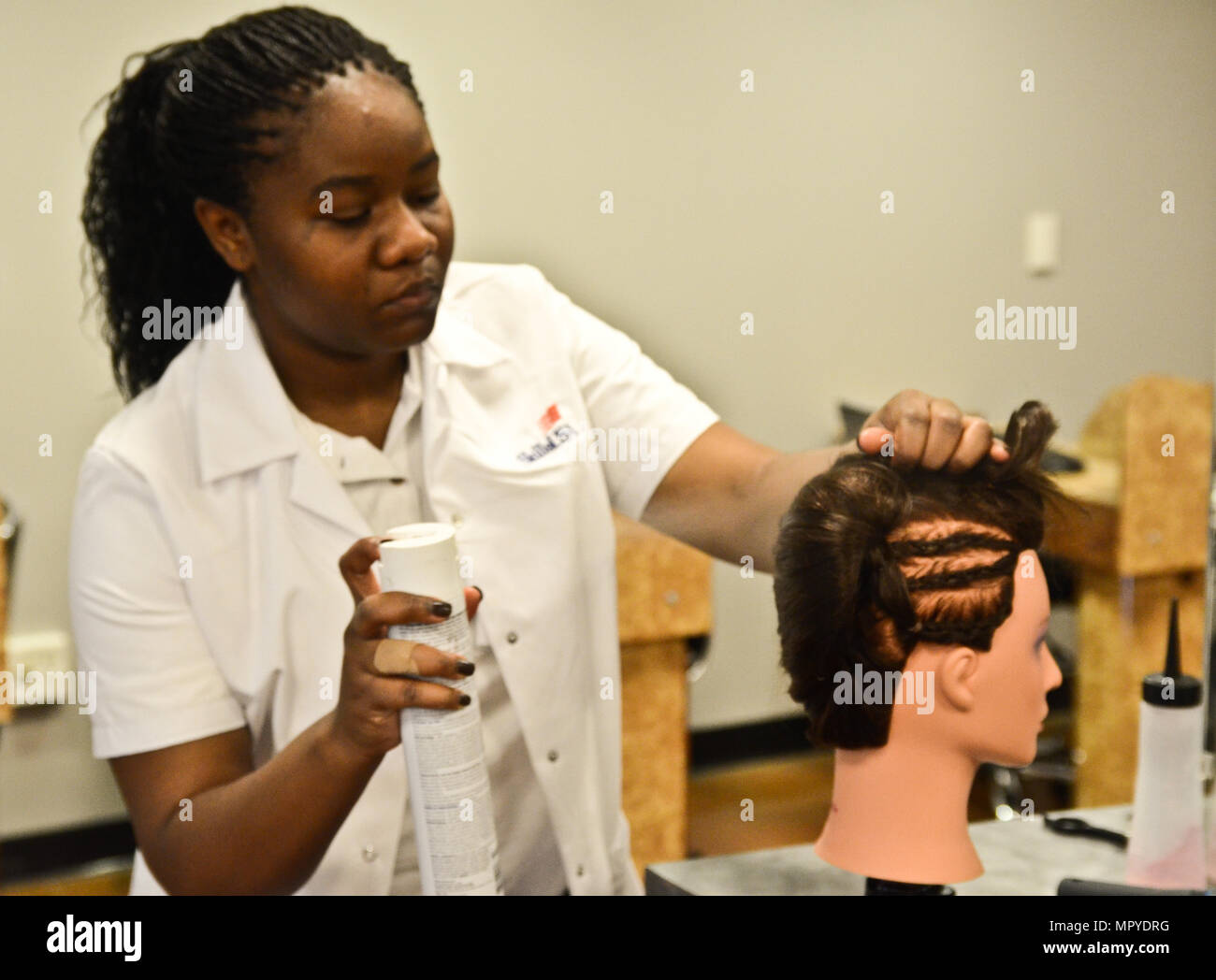A high school student from the Career and Technical Education Center ...