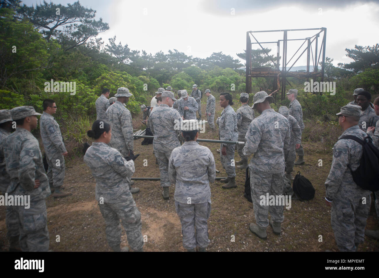 U.S. Air Force Airmen assigned to the 18th Medical Group work together ...