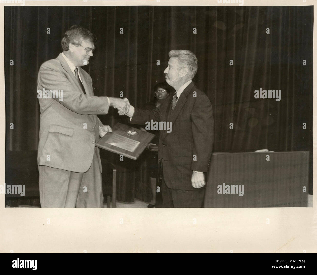 Admin. Atwood Honors-Ceremony USAID - Man receiving award on stage ...