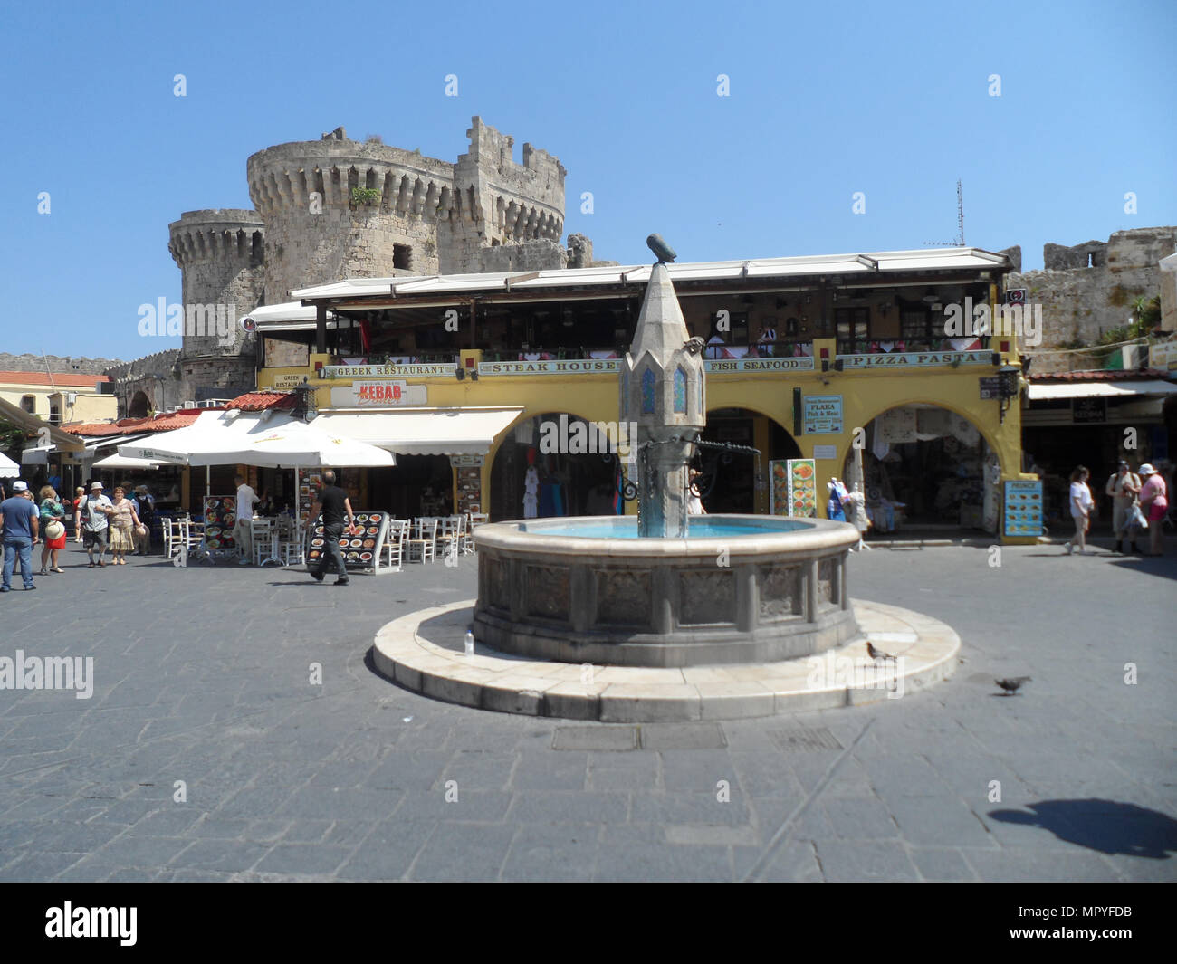 The fountain in the center of Hippocrates Square, Rhodes Old Town ...