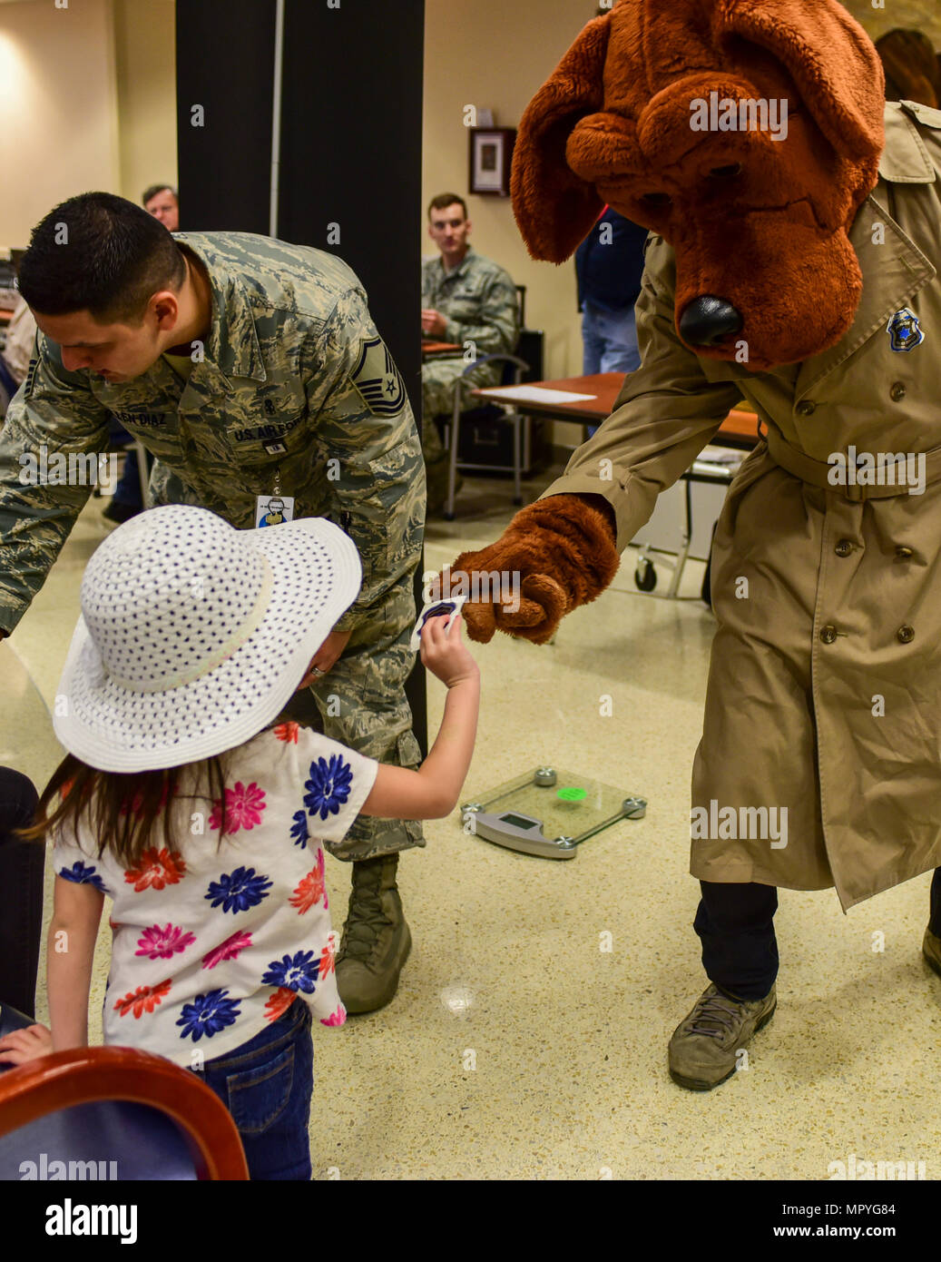 McGruff the Crime Dog passes out stickers during the 2017 Children’s ...