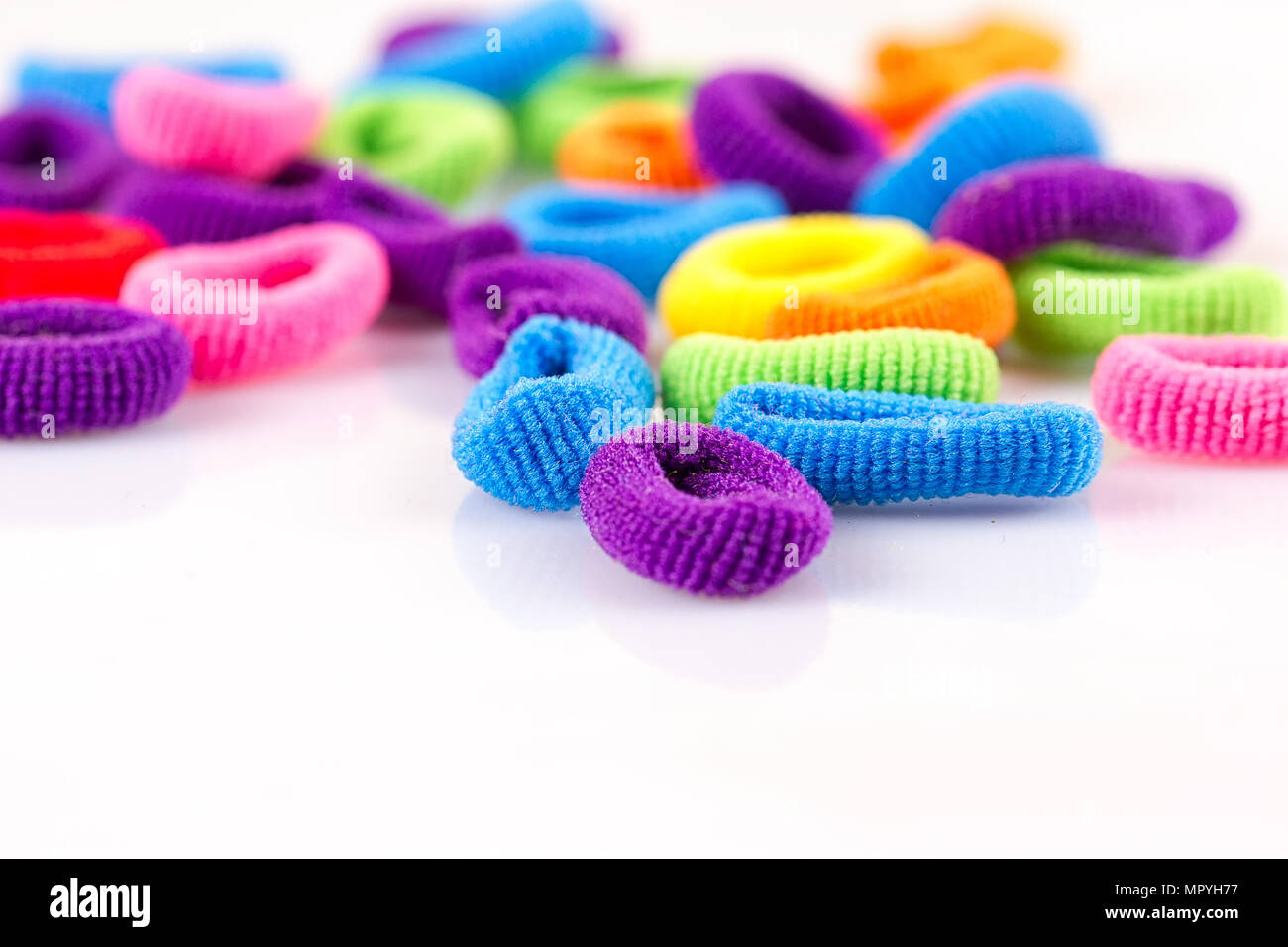 Hair elastic bands isolated on the white background Stock Photo - Alamy