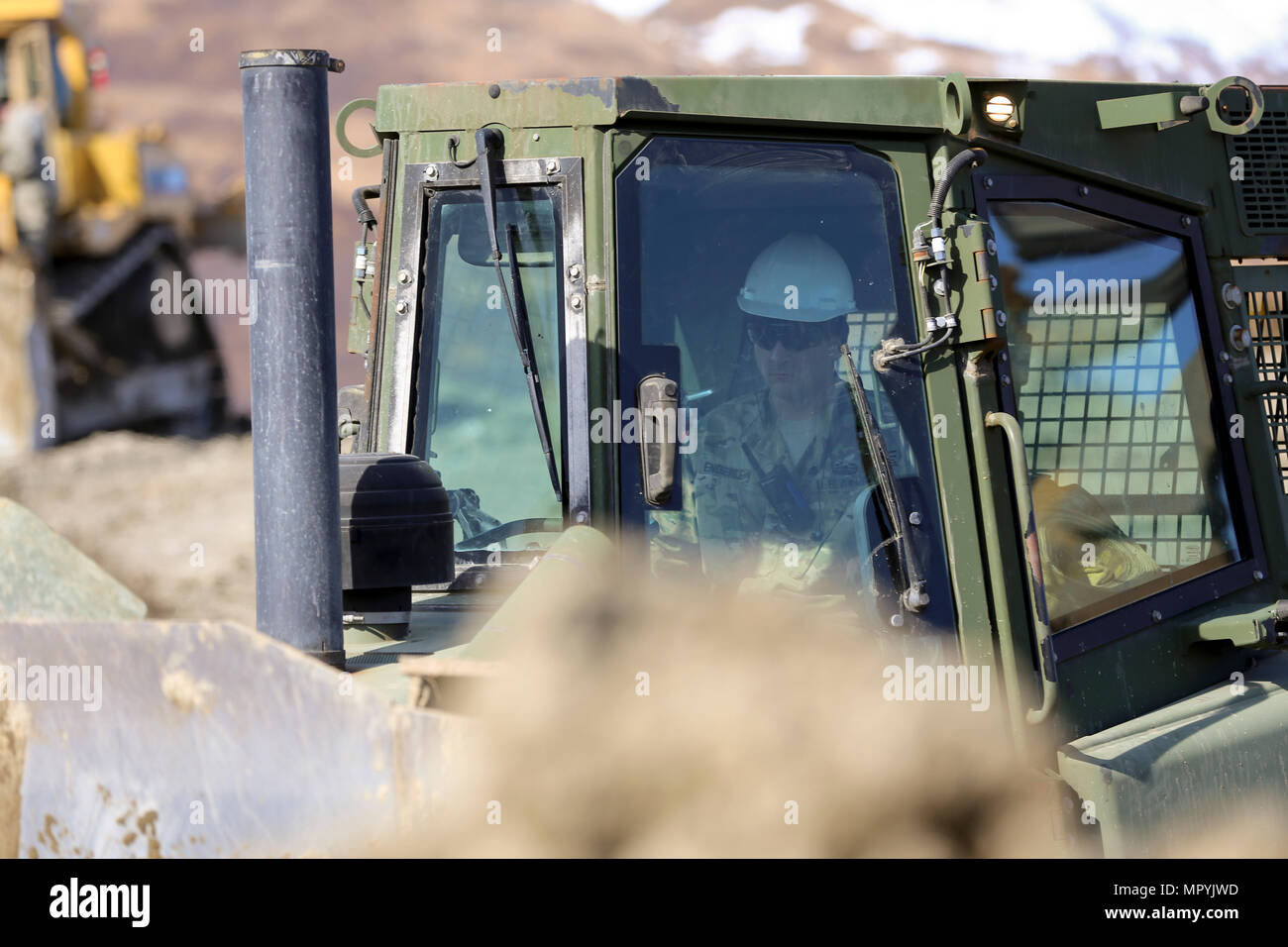 Alaska Guardsman Sgt. Jeffery Enderle, a horizontal equipment ...