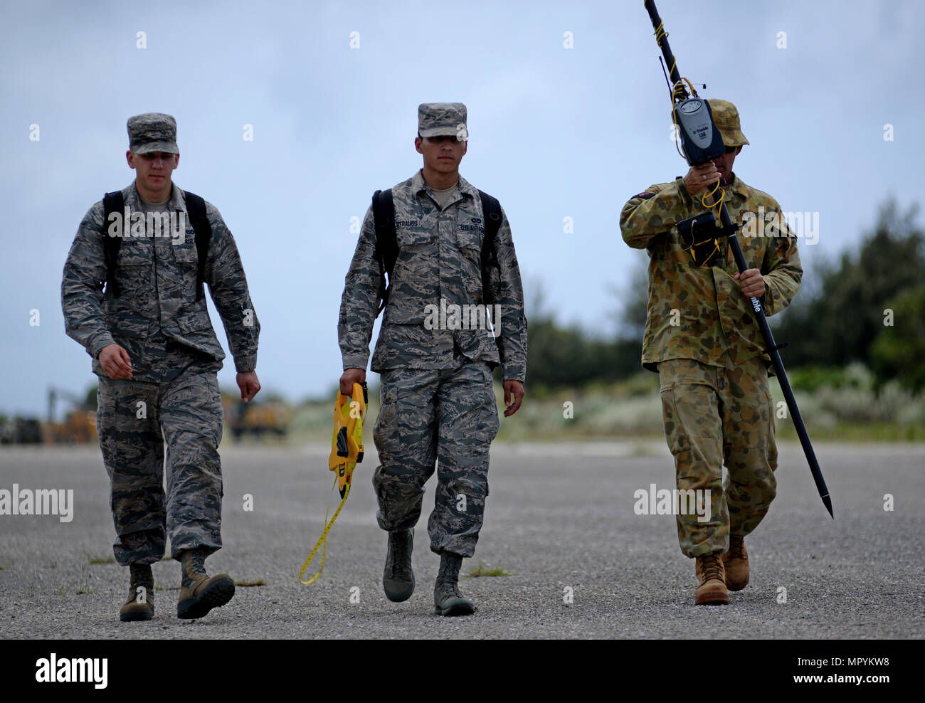 U.S. Air Force Airmen 1st Class Richard Brown, left, and Nathan Strauss ...