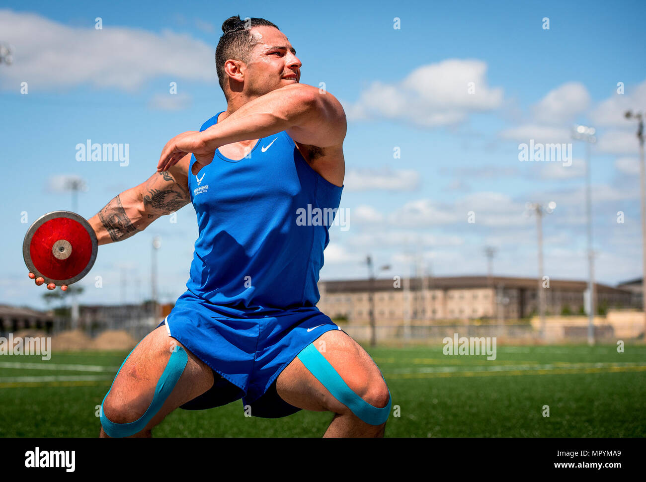 Staff Sgt. Vince Cavazos, a Warrior Games athlete, begins his discus ...