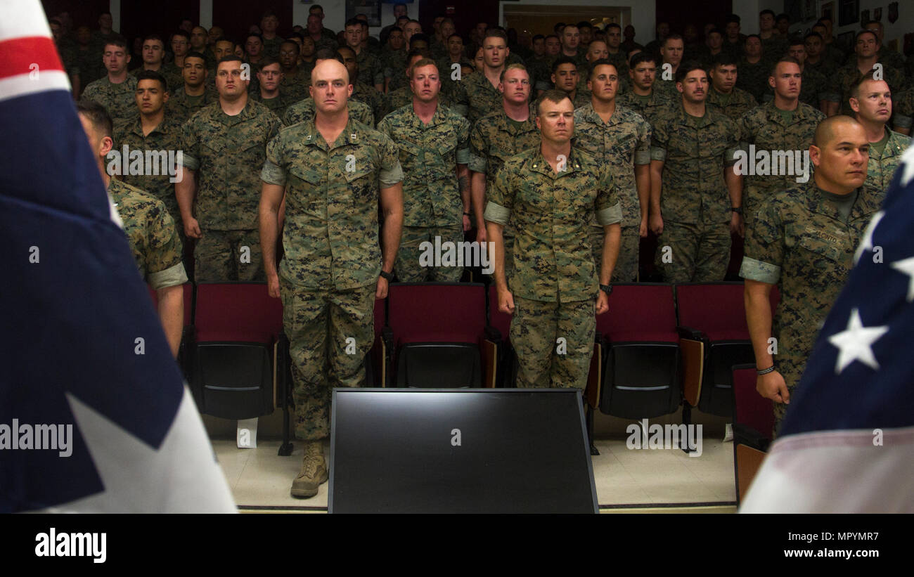 Marines with Tactical Training Exercise Control Group stand at attention during an Australian ...