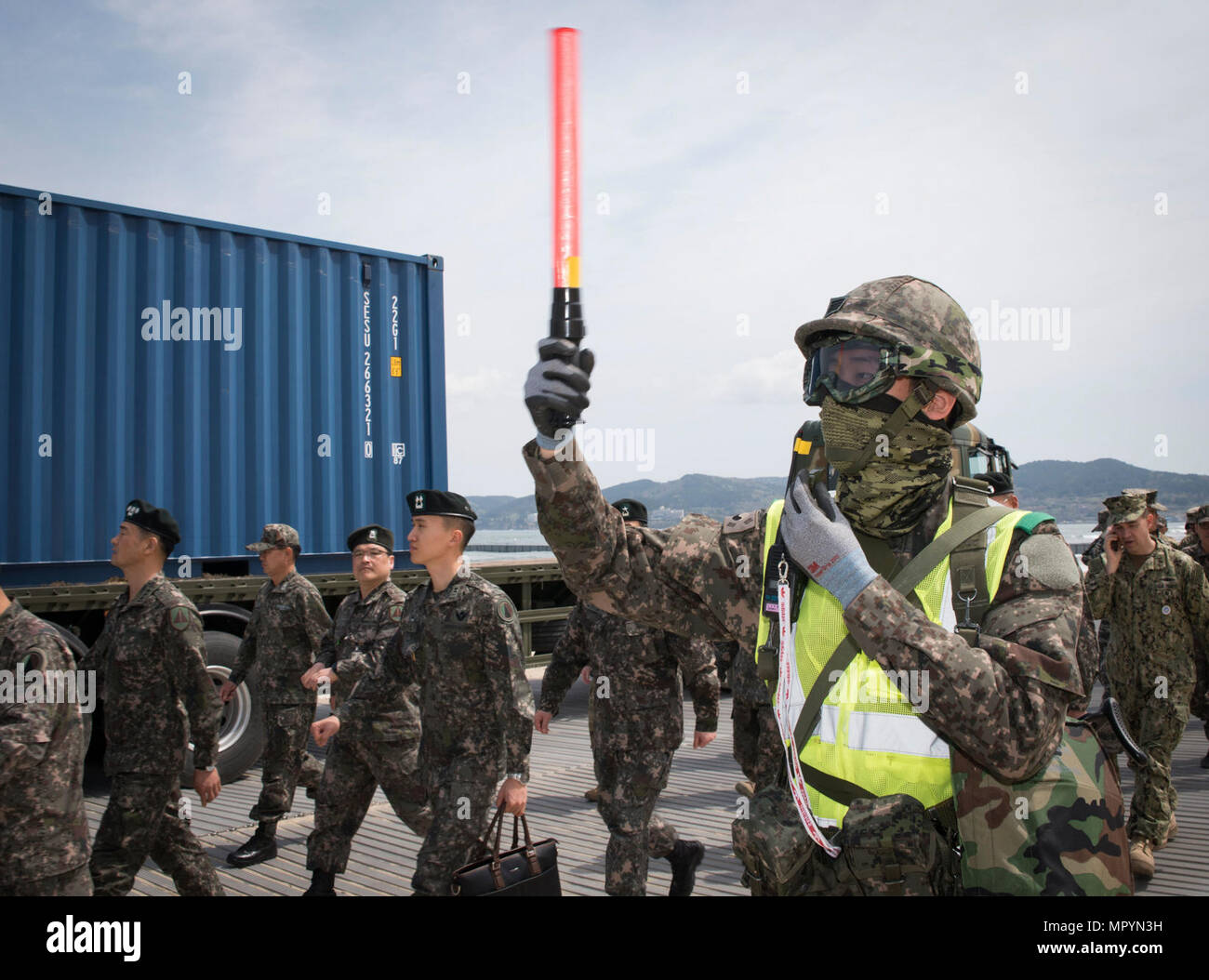 POHANG, Republic of Korea (April 12, 2017) – ROK Marines guide traffic ...