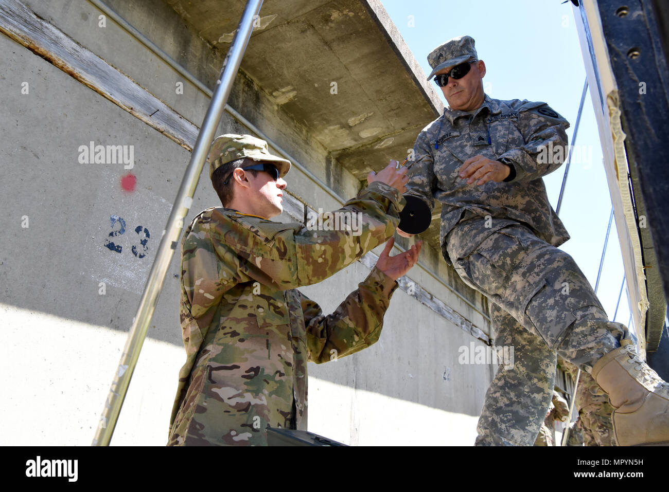 Sgt. Christopher Wuertz and Sgt. Kenneth Hill, both military police ...