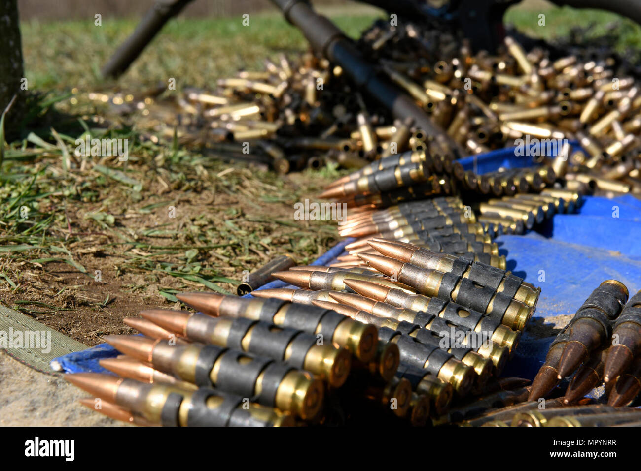 Ammunition lies on the ground on a crew-served weapon weapons firing ...
