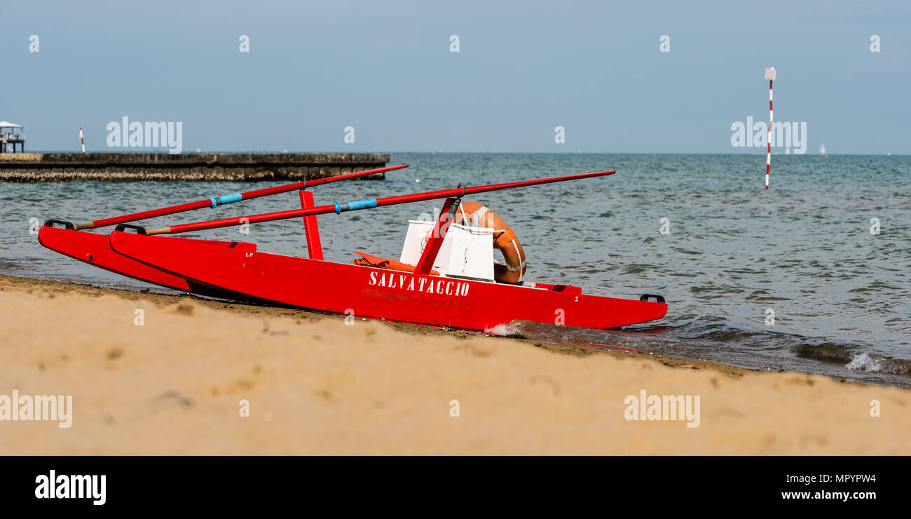 Red boat on the beach Stock Photo - Alamy