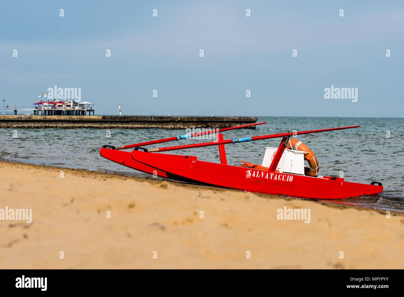 Red boat on the beach Stock Photo - Alamy