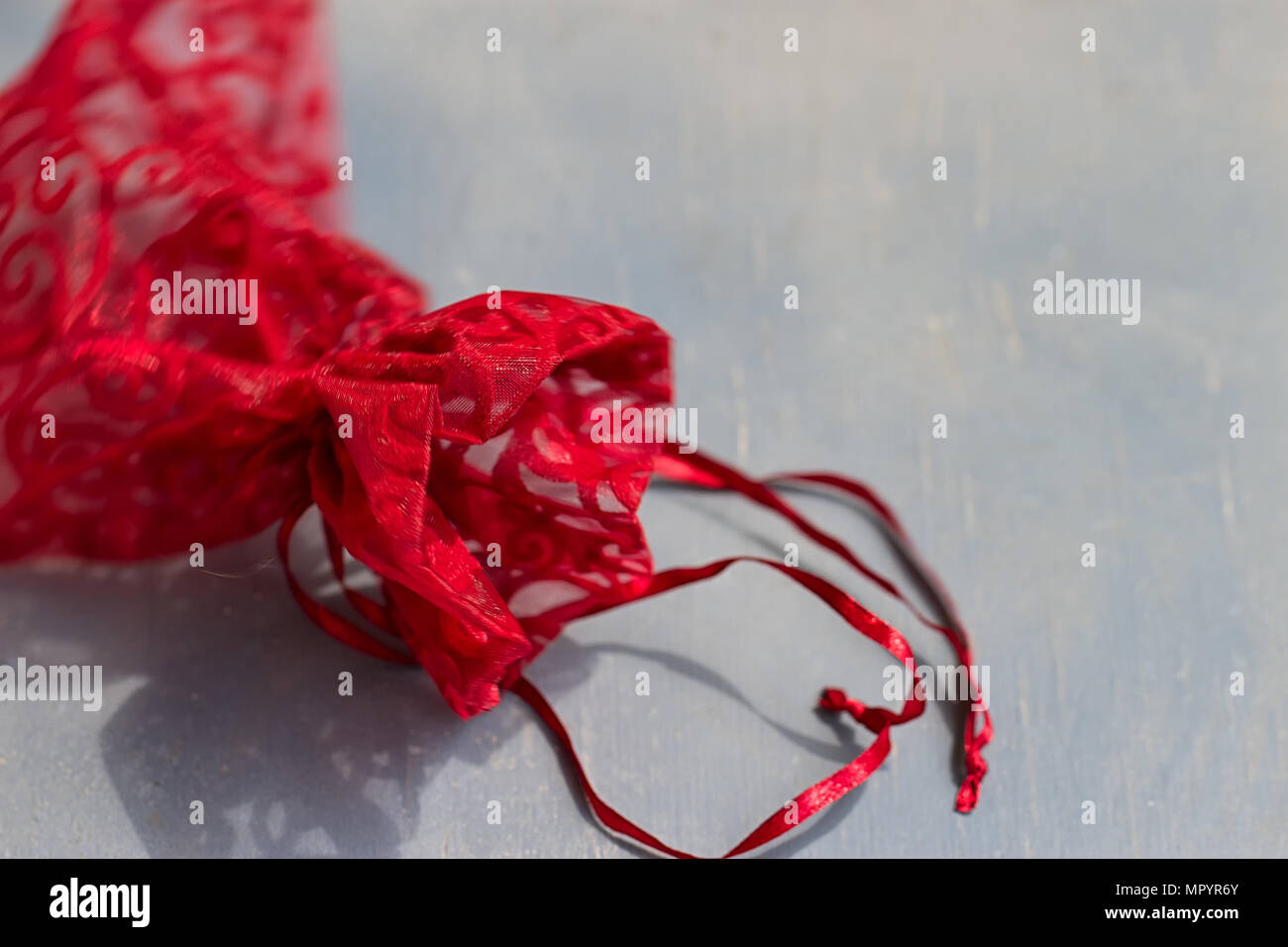 White drawstring fabric pouch hi-res stock photography and images - Alamy