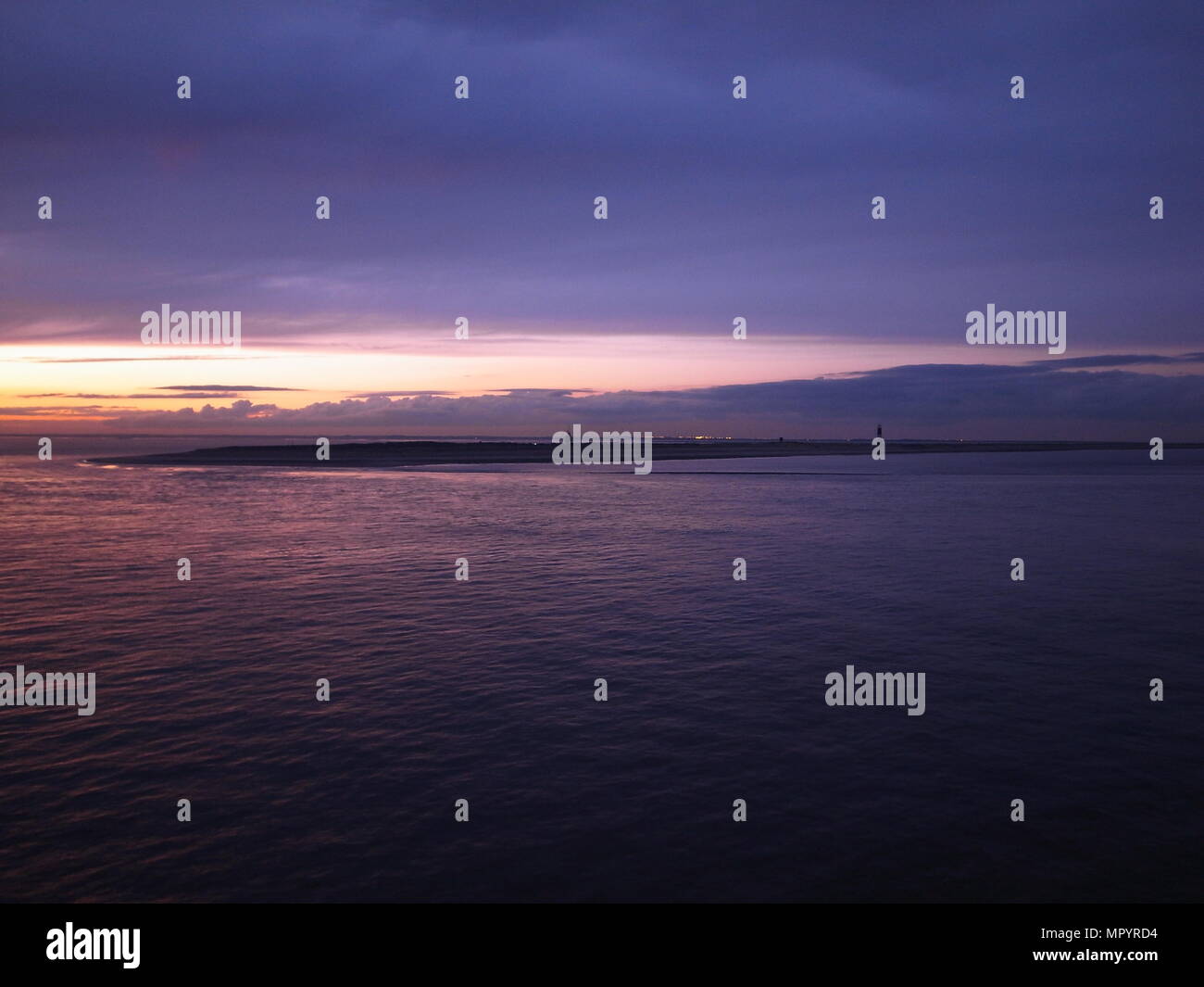 Sailing past Spurn Head at sunset, East Yorkshire, mouth of the Humber ...