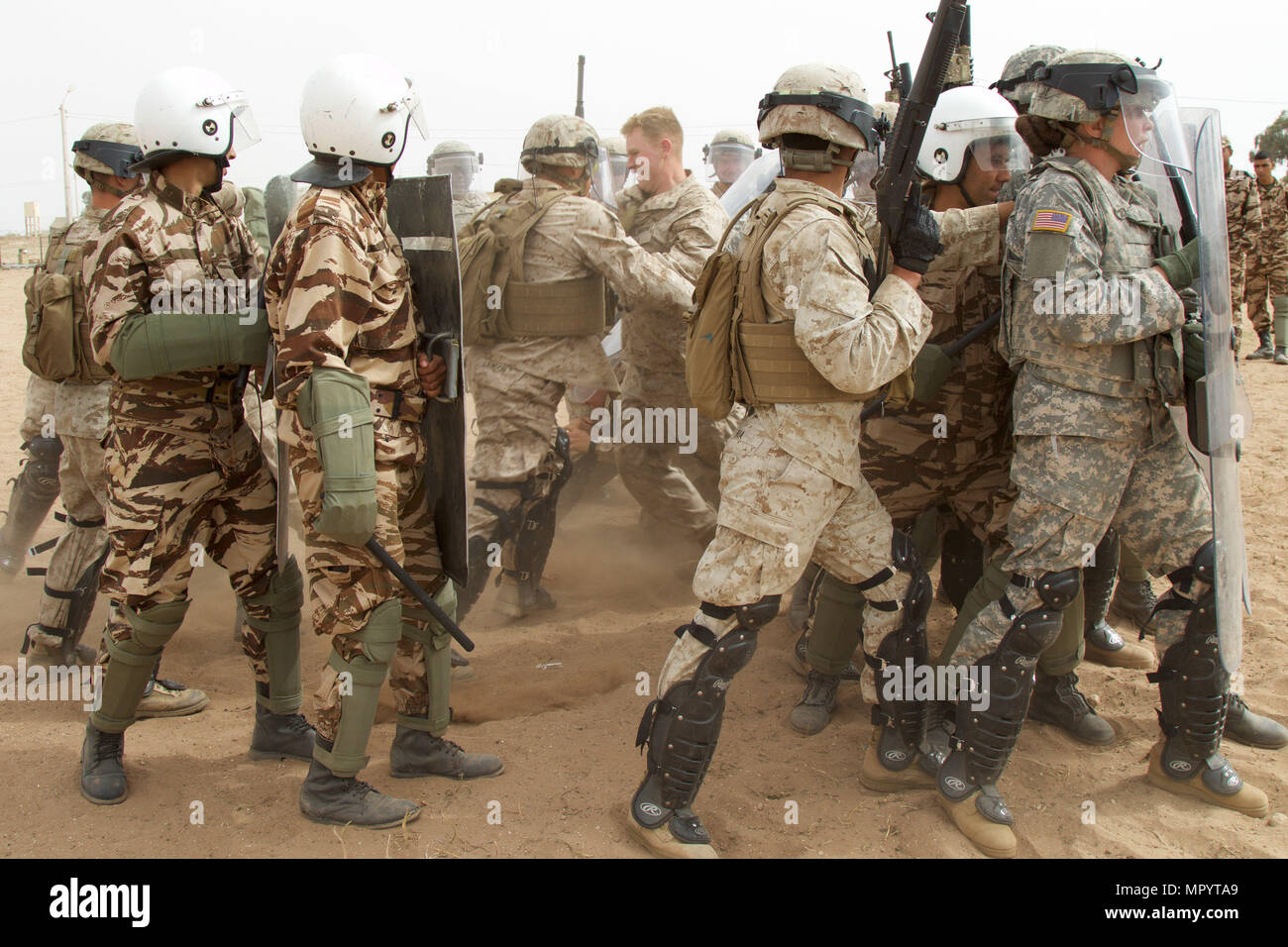 U.S. Soldiers and Marines participate in crowd control training Royal ...