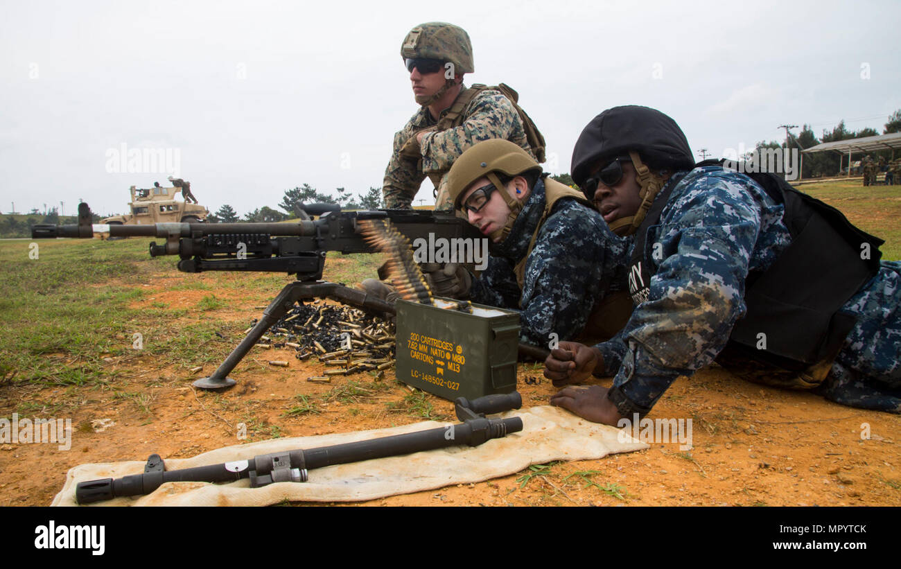 U.S. Marine Corps Cpl. Triston Morrison-Price, left, a machine gunner ...