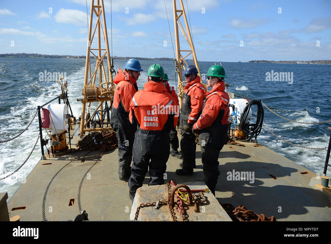 The crew from Aids-to-Navigation Team Bristol discusses a game plan for ...