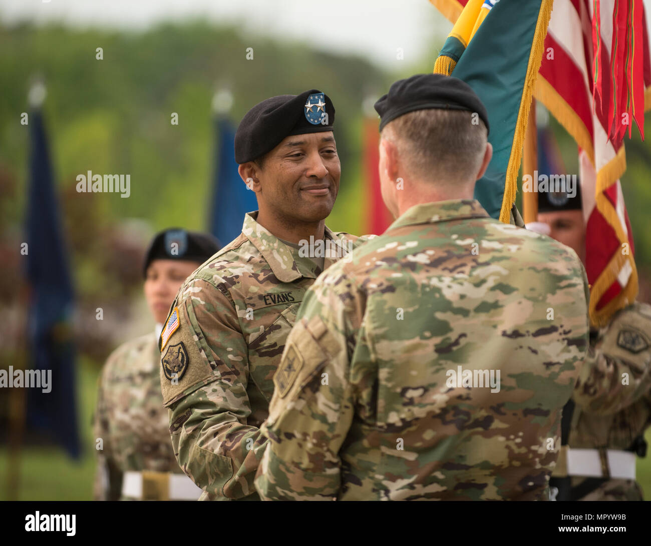 Incoming HRC commander, Maj. Gen. Jason T. Evans (left), accepts the ...