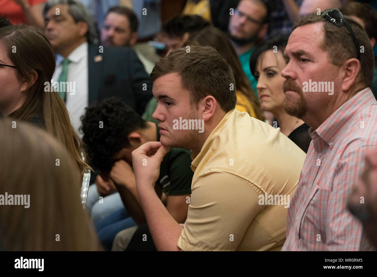 School shooting survivor Aaron Chenoweth listens after speaking as ...