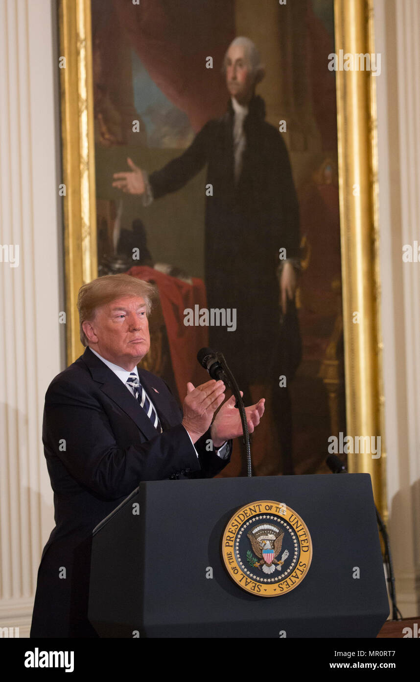 United States President Donald J. Trump applauds before presenting the ...