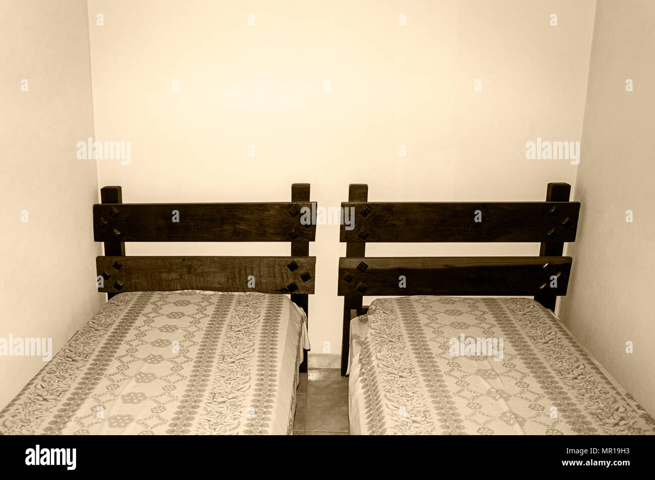 wooden bed white wall bedroom blanket rustic vintage Stock Photo - Alamy