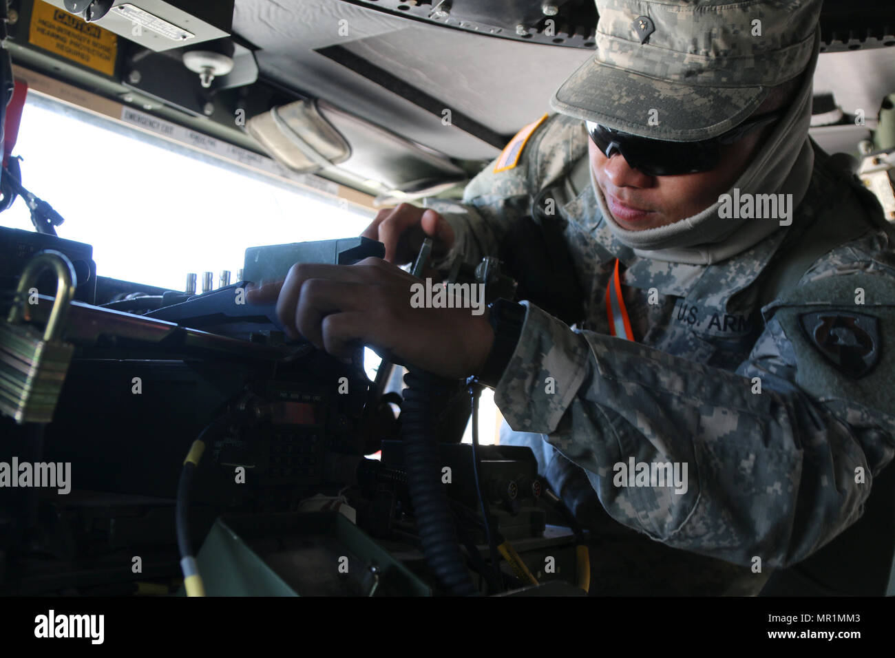 Spc. Hai Tran, an information technology specialist with the 1034th ...