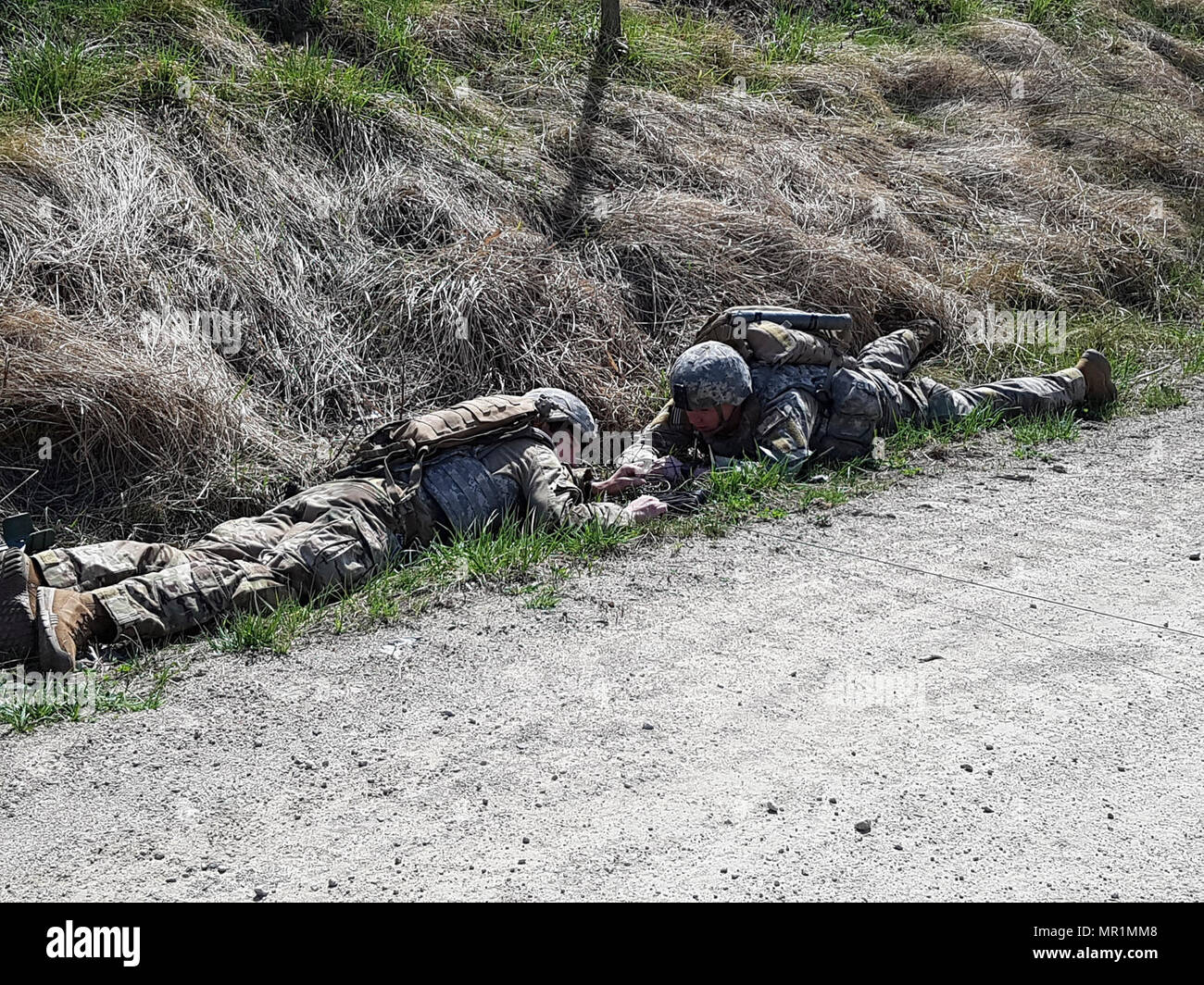 Spc. Richard Jarrell and Spc. John Simmons, assigned to the 23rd ...