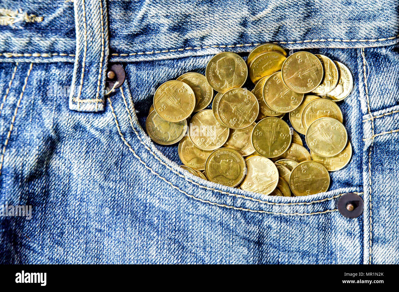 Texture of blue jeans and coin, jeans lack pattern background, blue ...