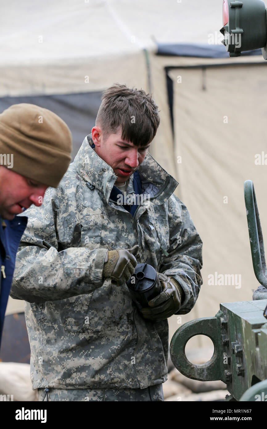 Alaska Guardsman Spc. Brodie Smith, a wheeled vehicle mechanic, 207th ...