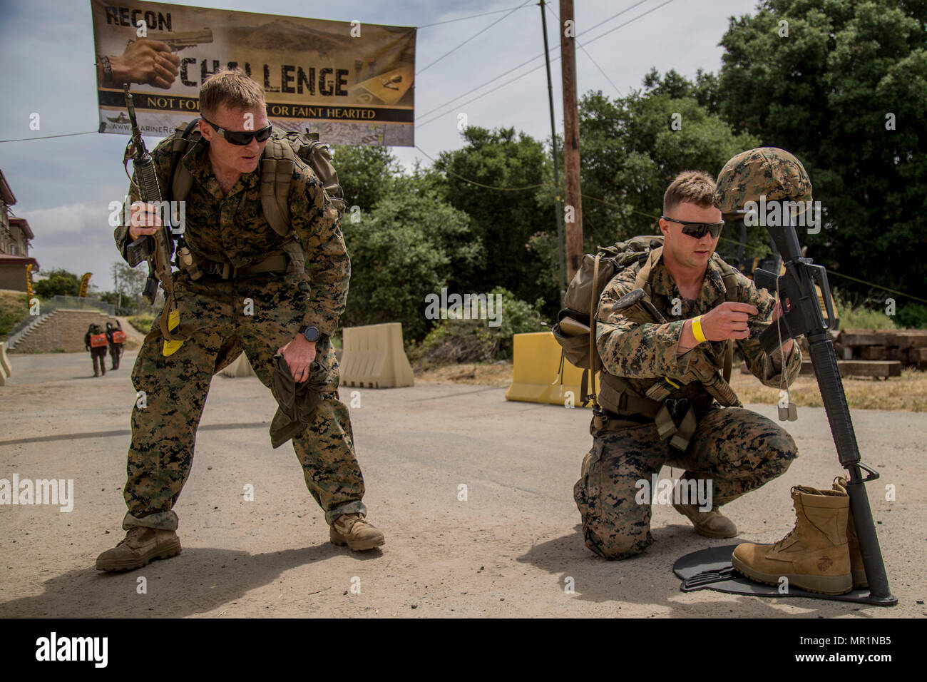 U.S. Marine Corps Sgt.Thomas J. Foulke, left, and Staff Sgt. Carter ...