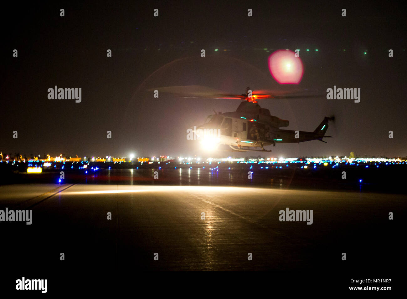 A U.S. Marine Corps UH-1Y Huey assigned to Marine Aviation Weapons and ...