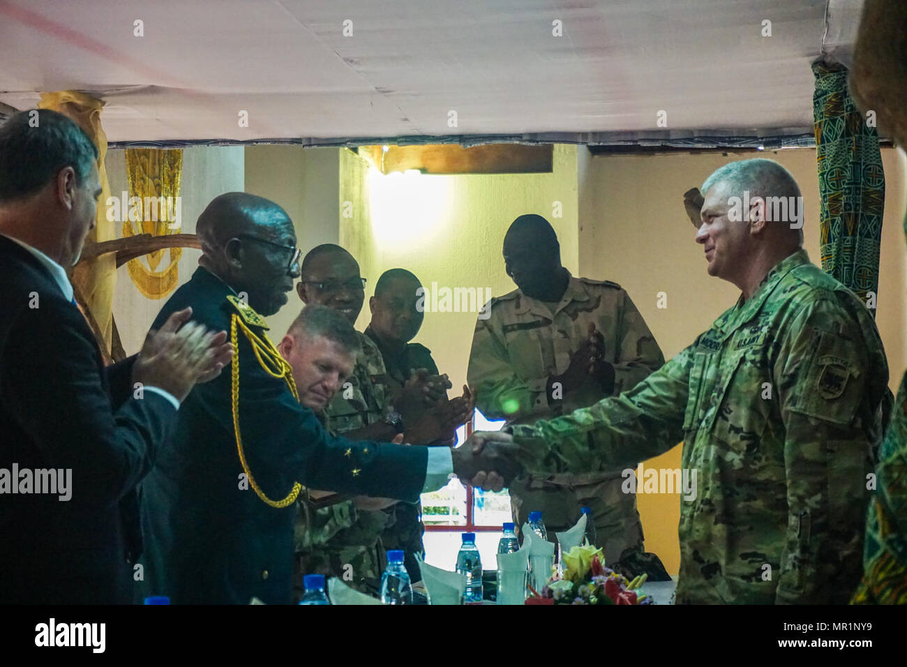 Maj. Gen. Baba Souley, Cameroon land force commander, shakes hands with ...