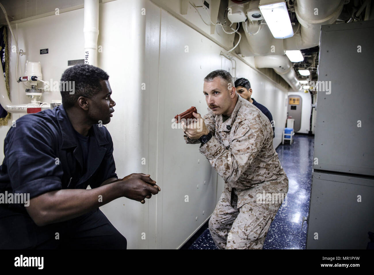 SEA (April 12, 2017) Gunnery Sgt. Arvin Manning, assigned to the law ...