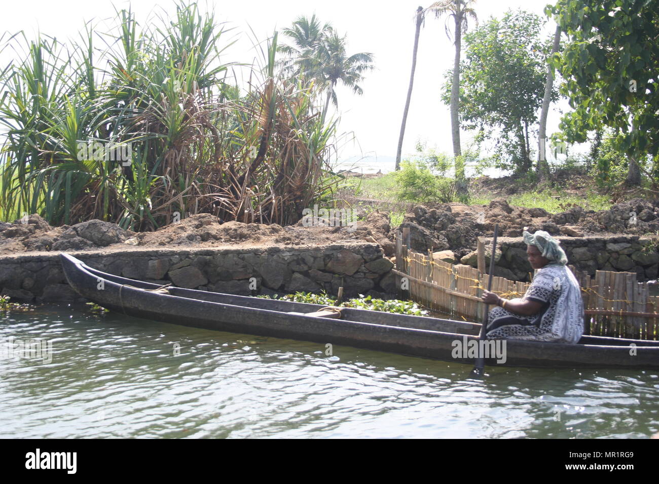Indian paddling canoe hi-res stock photography and images - Alamy