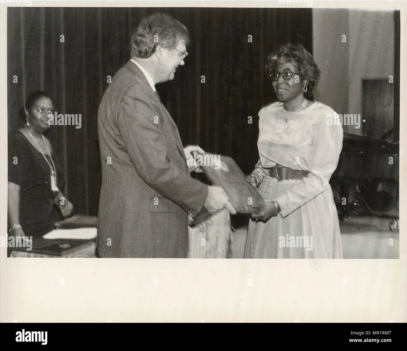 Admin. Atwood presenting general awards - Woman receiving award on ...