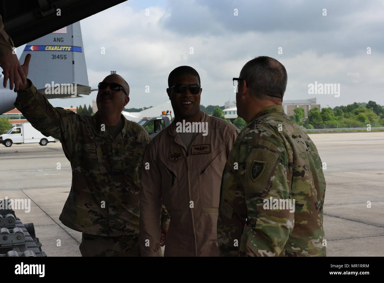 Command Sgt. Maj. John H. Swart, left, TSgt. Jimmy O. Sealy, and Maj ...
