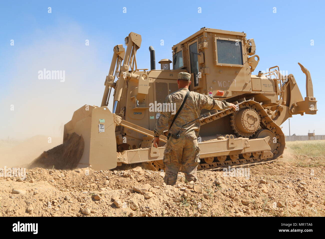 U.S. Army Sgt. Frederick Mickle, a horizontal construction engineer ...