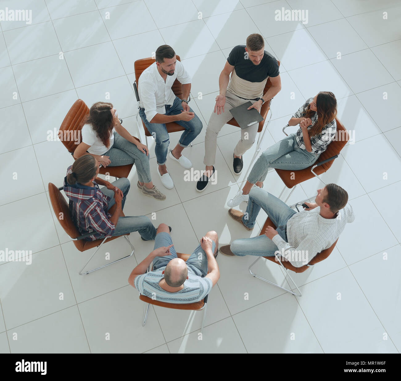 creative team sitting in class for team building Stock Photo - Alamy